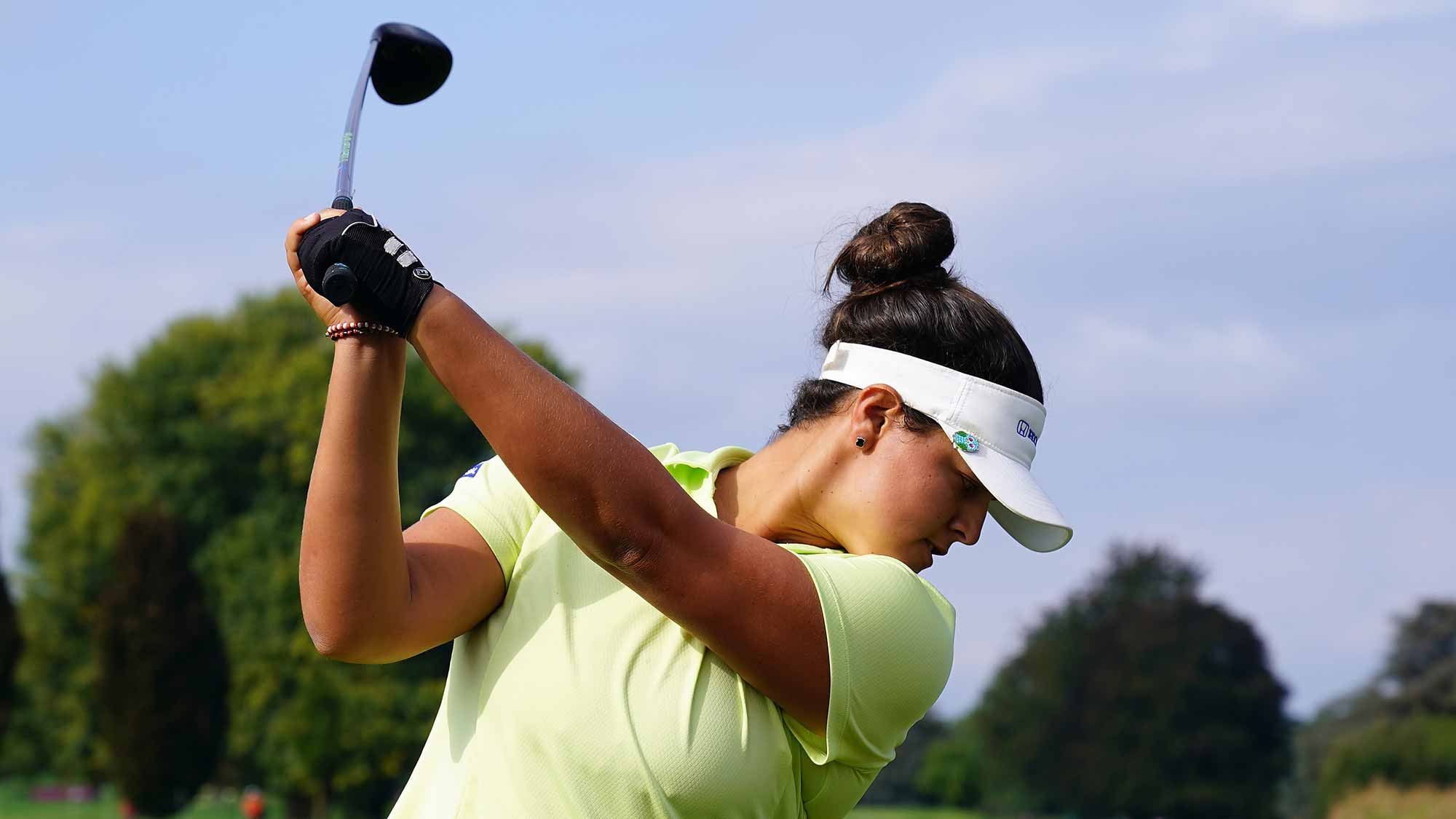 One Year After Surviving Hurricane Maria, Torres Shares Lead at Evian ...